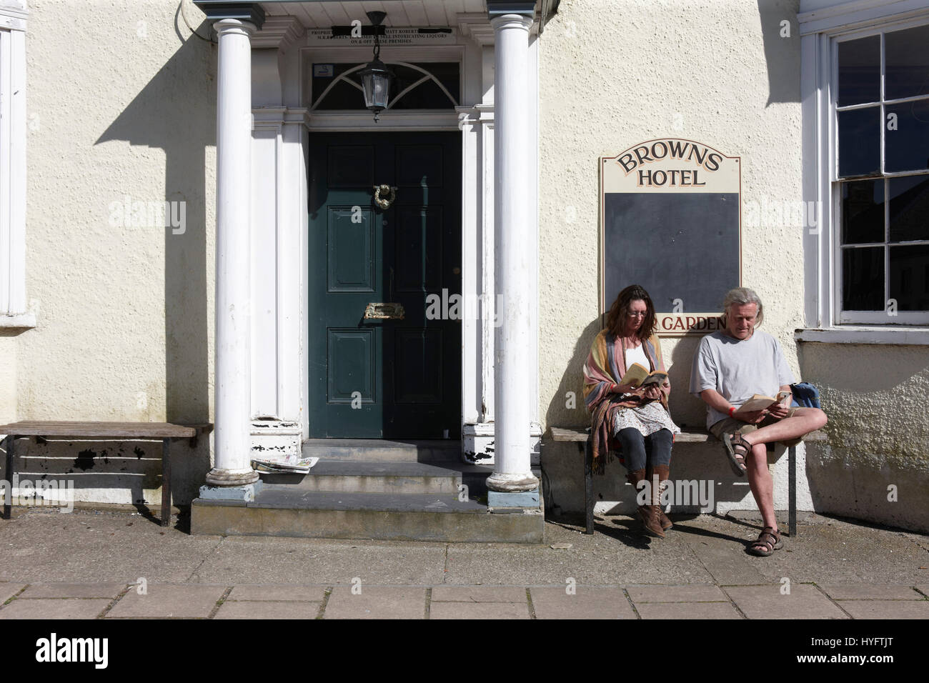 Two People Reading Outside A Hotel, The Literary Festival, Laugharne ...