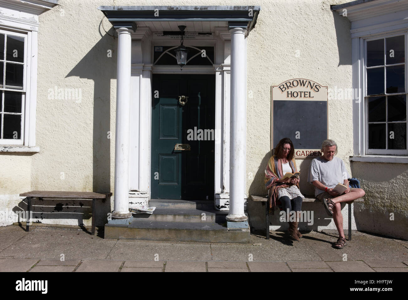Two People Reading Outside A Hotel, The Literary Festival, Laugharne ...