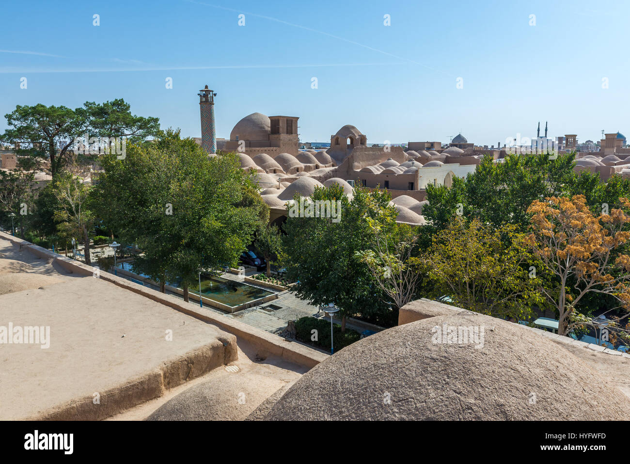 Aerial view with mosque minaret; small domes on the roofs of Khan ...