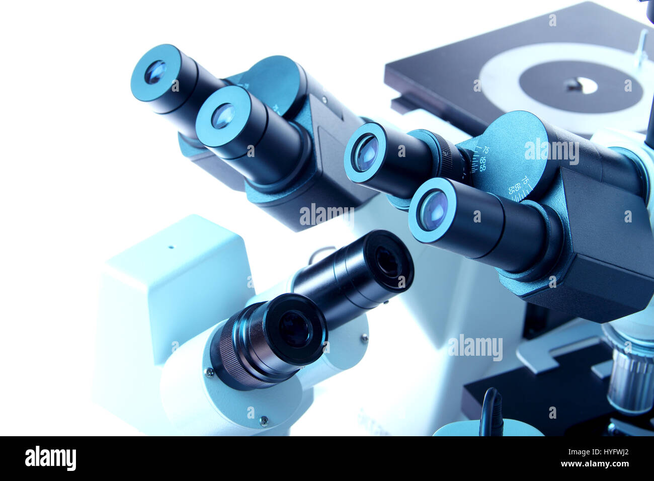 Group of various Microscopes in blue medicine light Stock Photo - Alamy