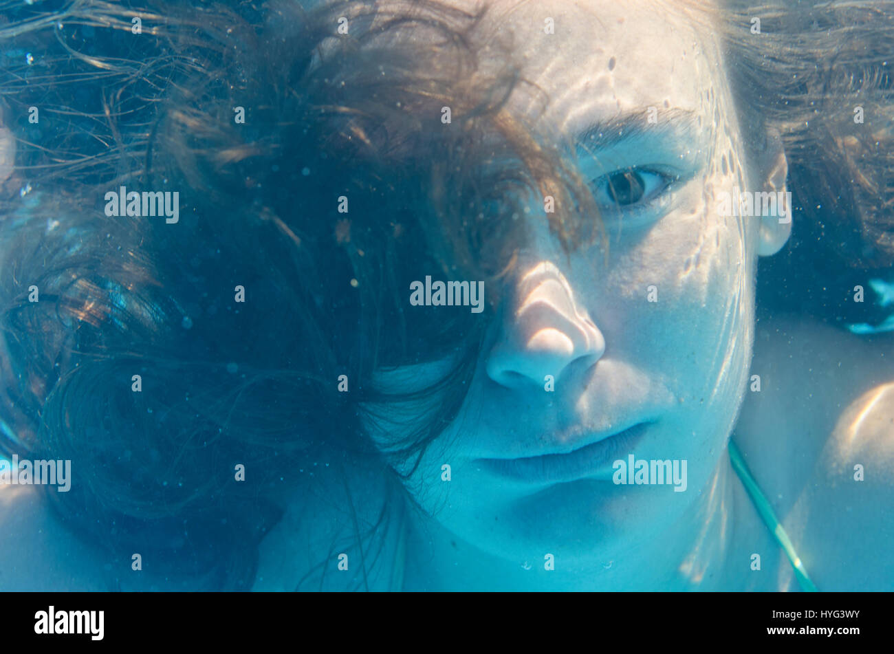 Adult swimming underwater pool hi-res stock photography and images - Alamy