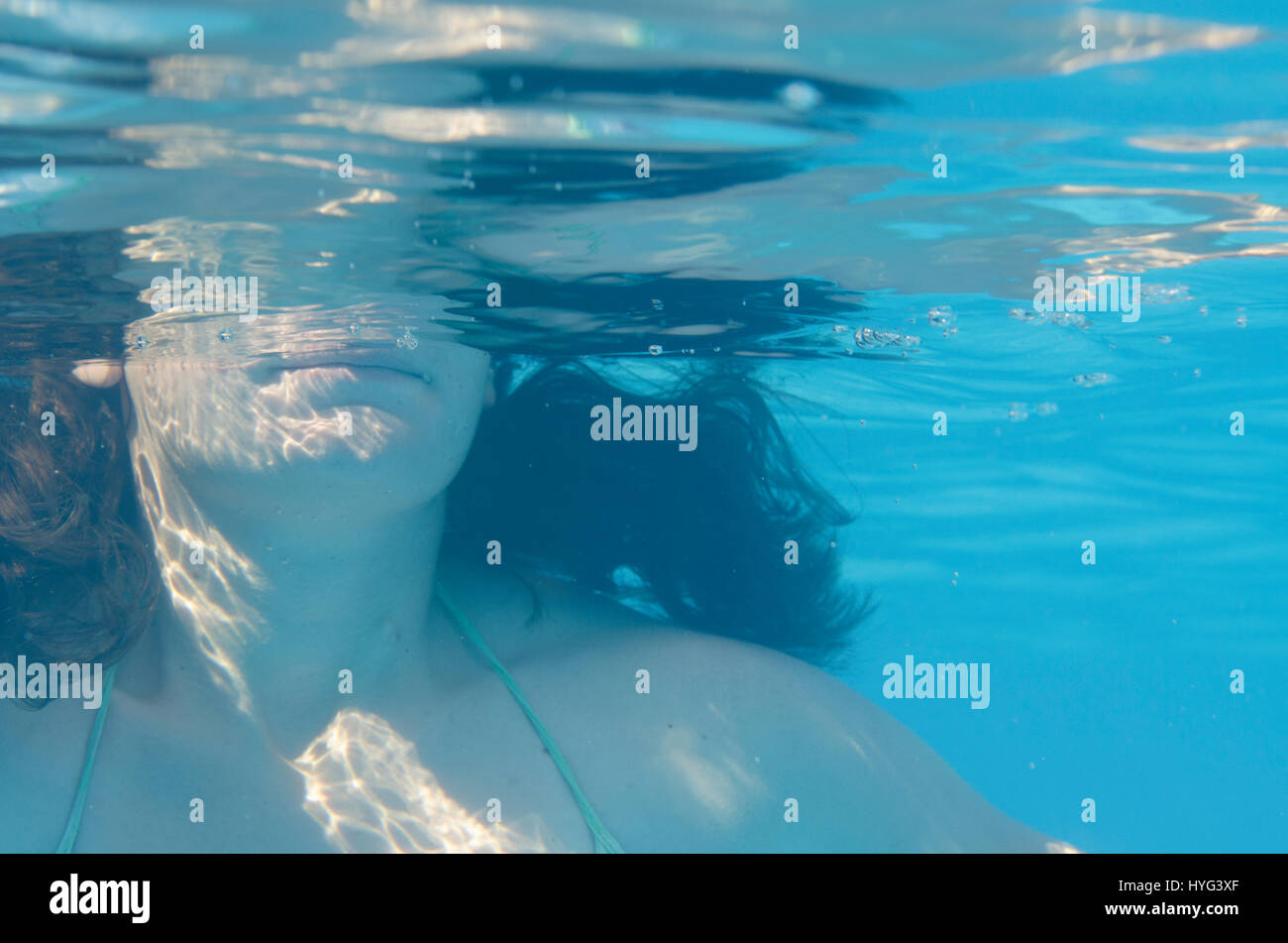 Adult swimming underwater pool hi-res stock photography and images - Alamy