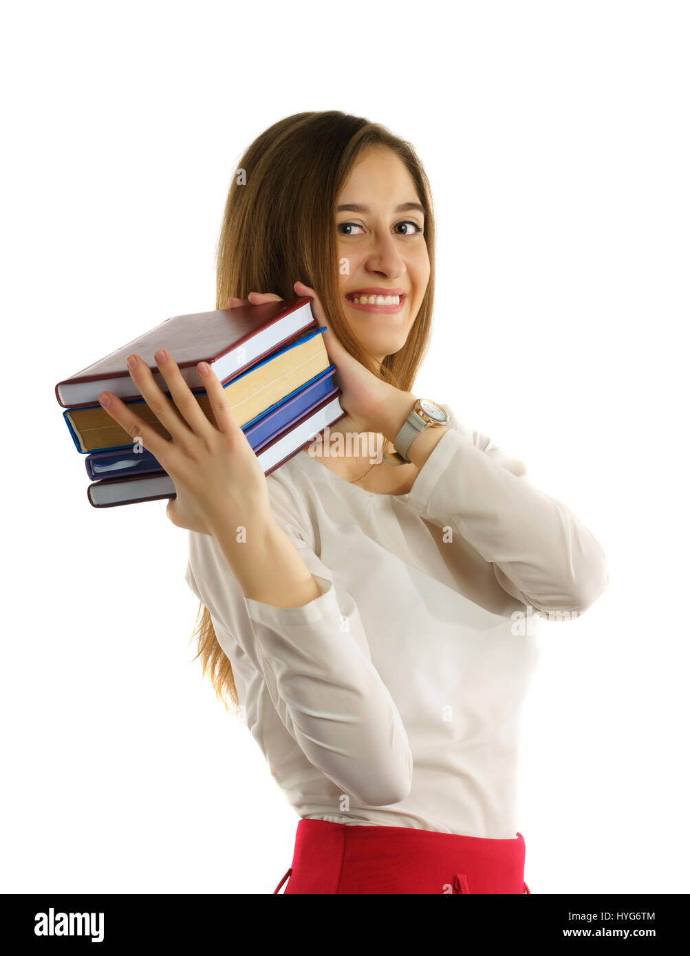 Pretty young student girl holds stack of books in hands Stock Photo - Alamy