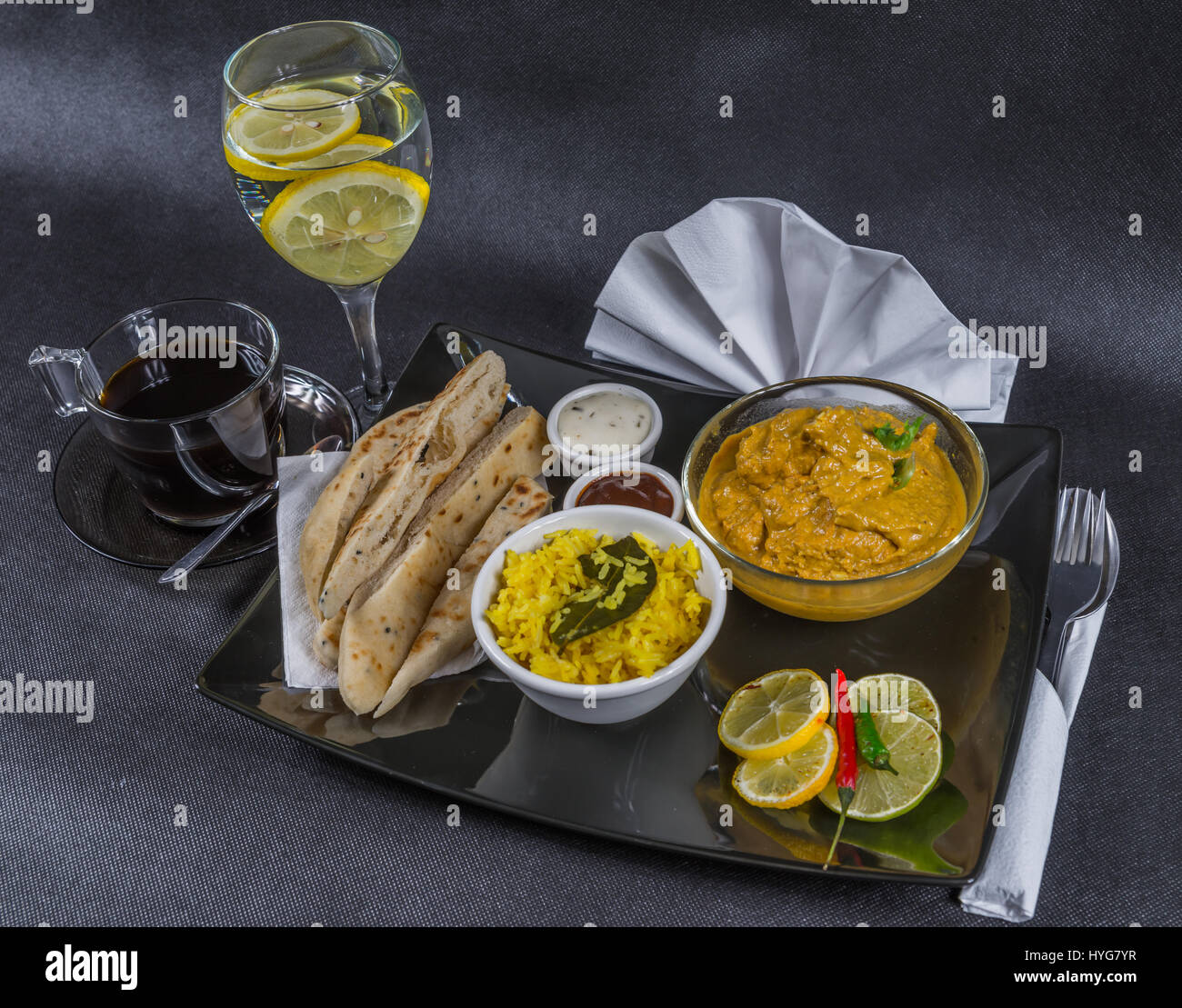 Oriental Indian set, chicken korma, naan bread, plate, coffee, water ...