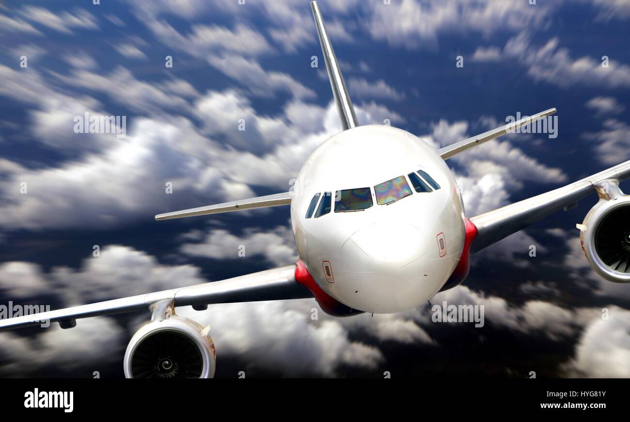 Airplane flying from nose view Stock Photo - Alamy