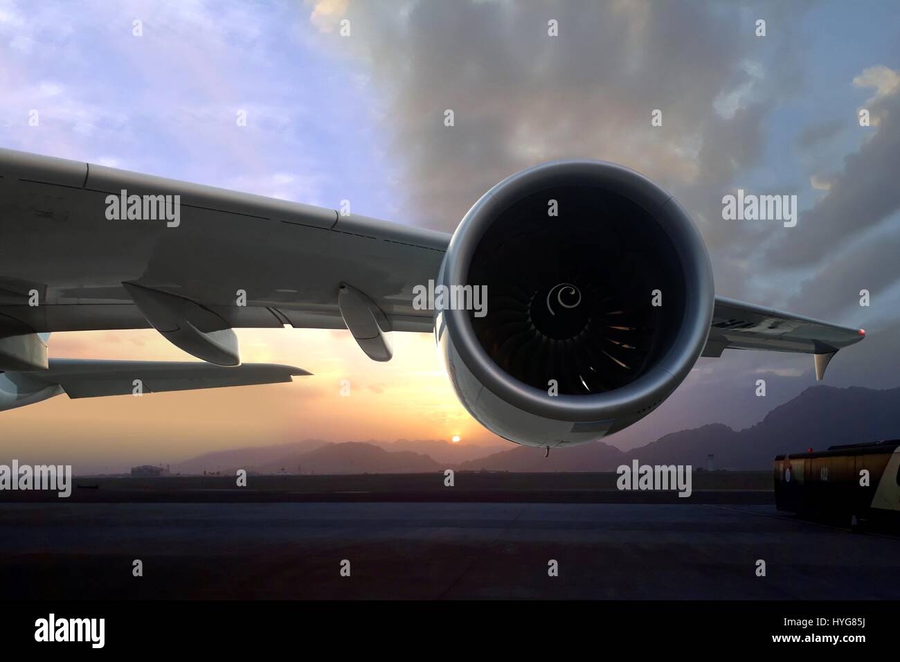 Commercial airplane turbine engine on runway Stock Photo - Alamy