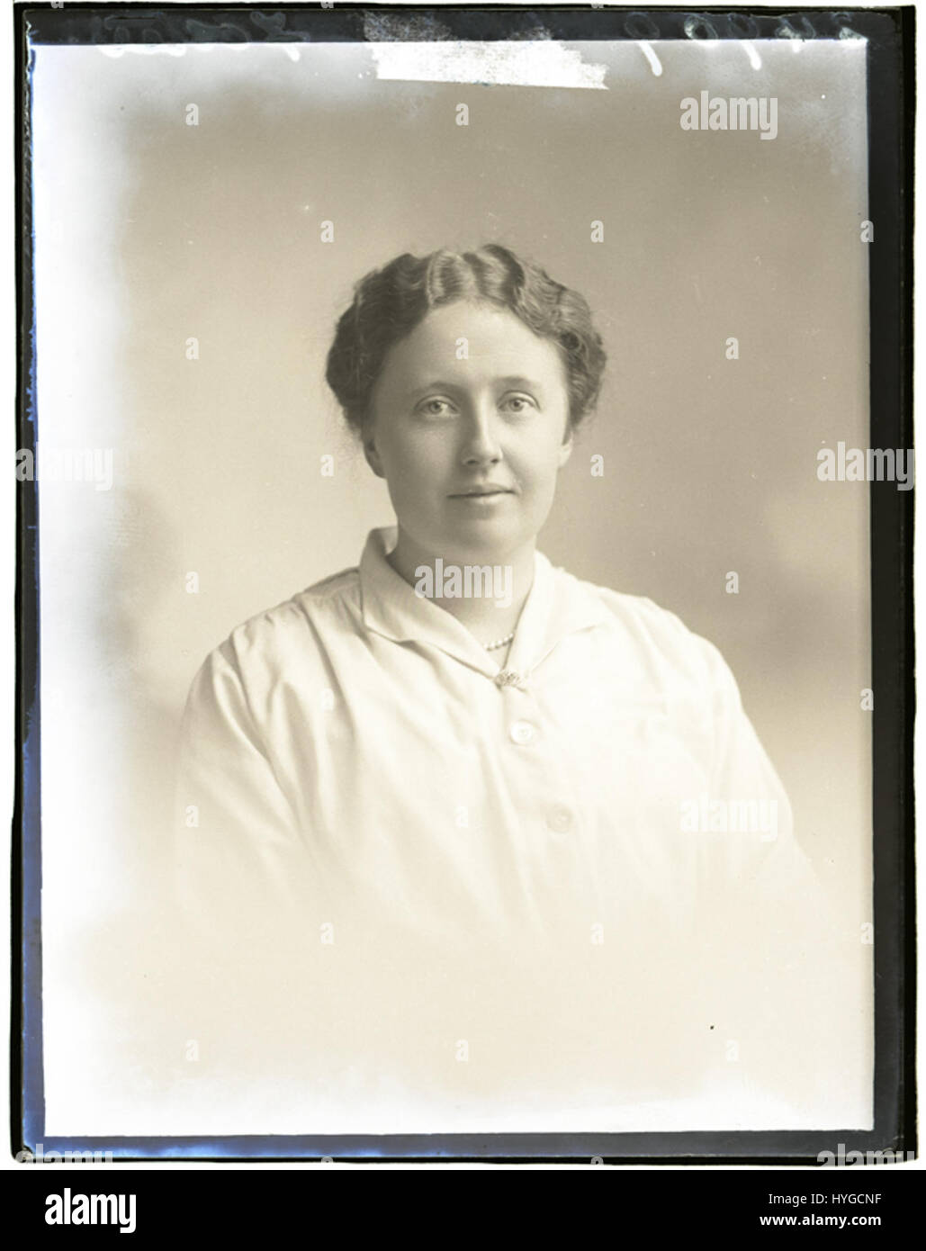 A portrait of Miss R Foster, dated December 21, 1916, captures her in ...