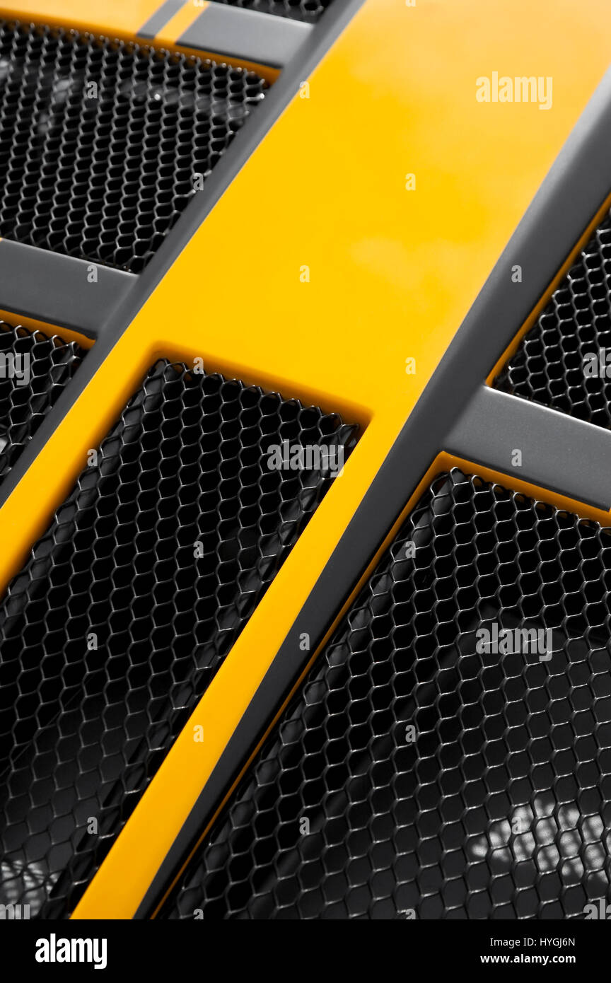 yellow and black luxury sports car engine vent panel Stock Photo - Alamy