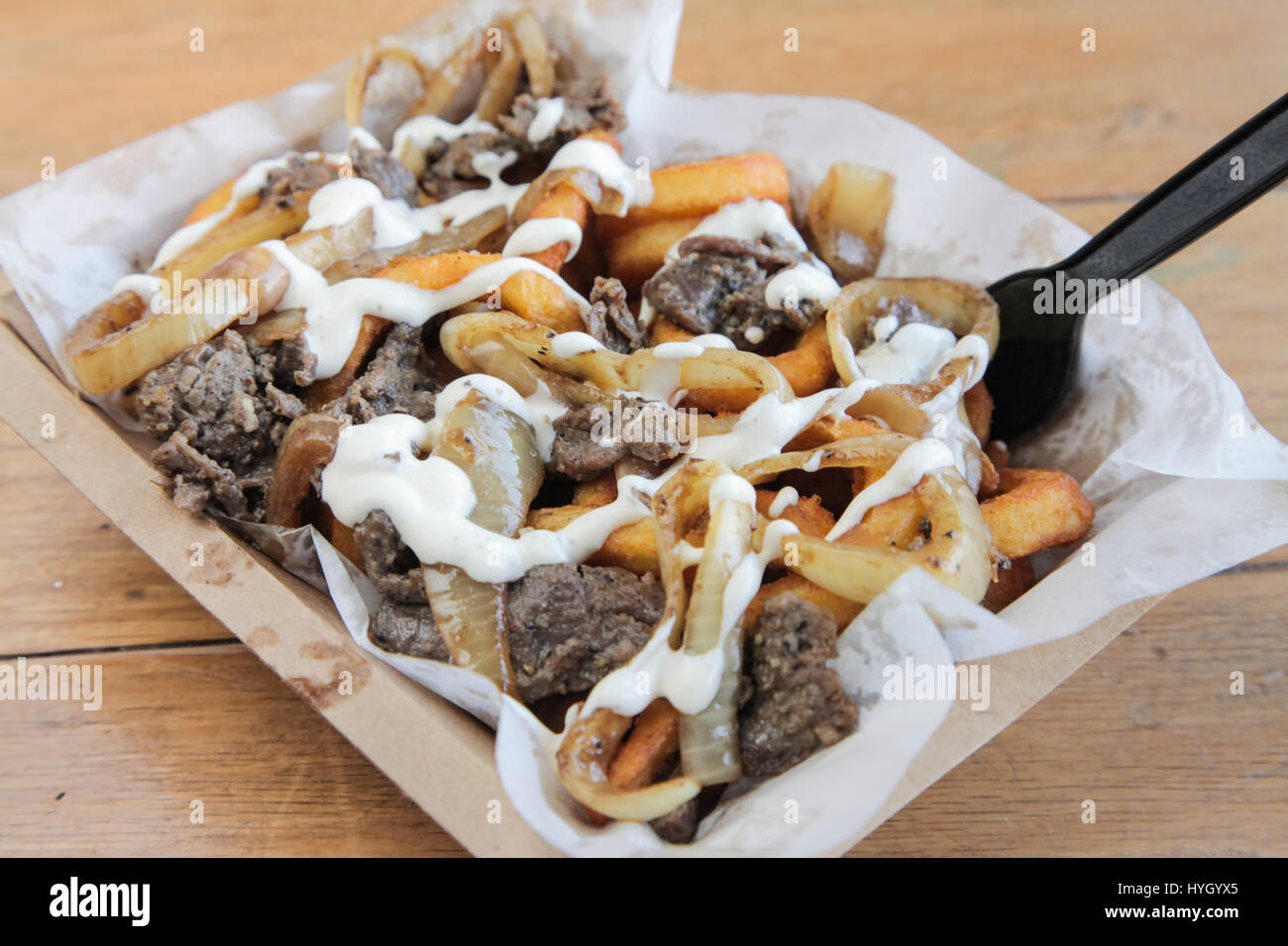 Curly fries and cheese hi-res stock photography and images - Alamy