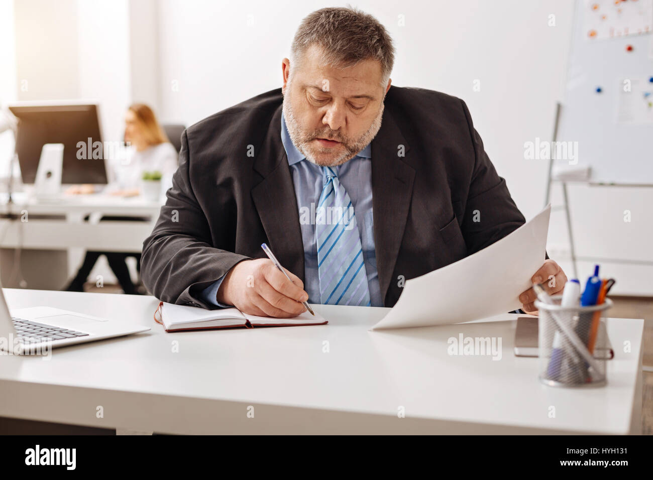 Frontline company employee focused on the task Stock Photo - Alamy