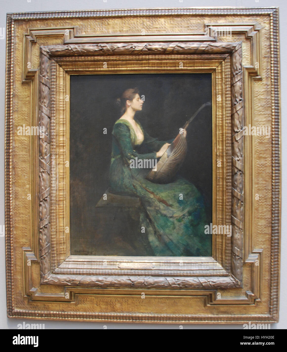 Thomas Dewing Lady with a lute Stock Photo - Alamy