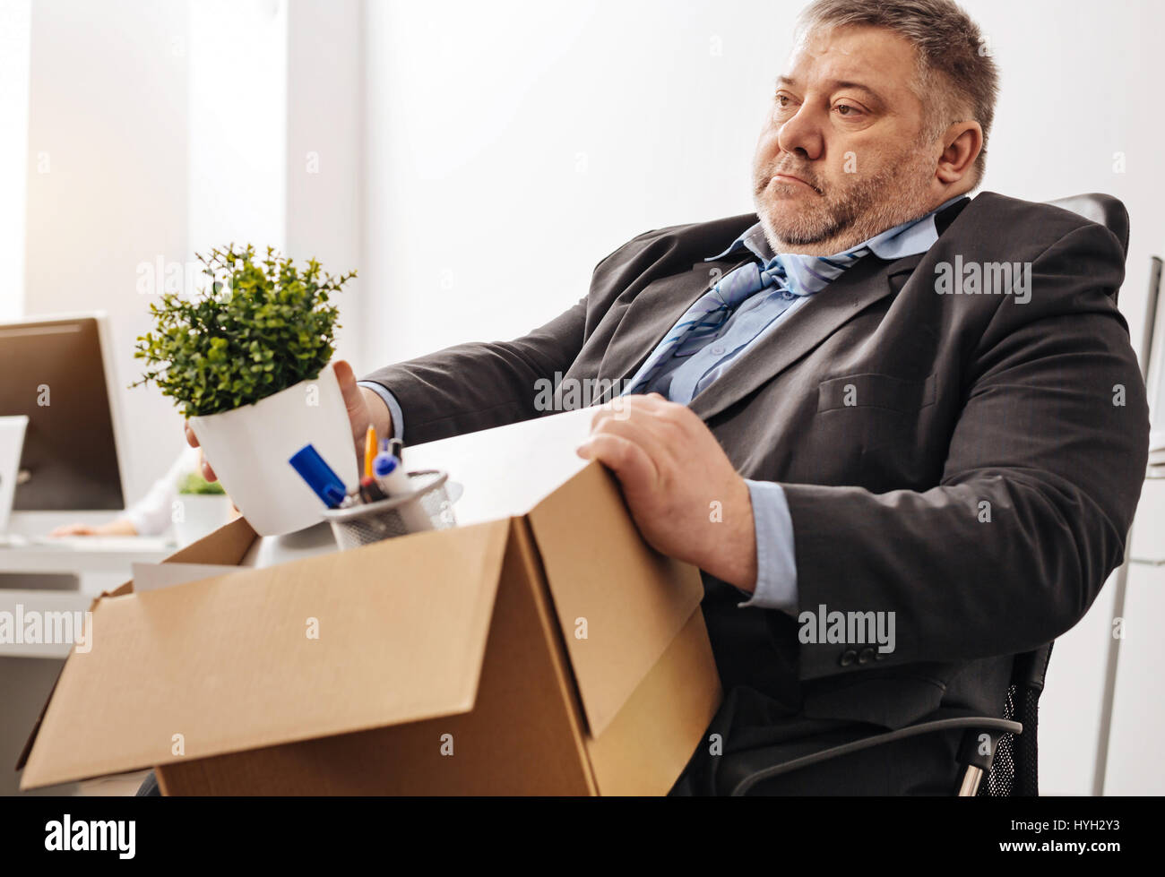 Distressed shocked employee looking hopeless Stock Photo - Alamy
