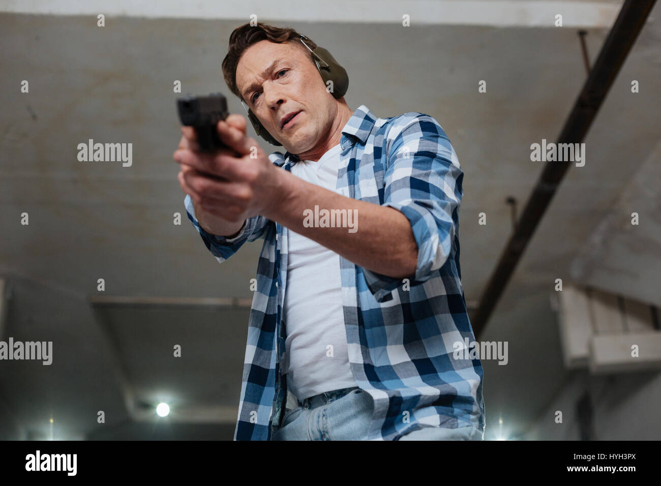 Determined professional marksman training Stock Photo - Alamy