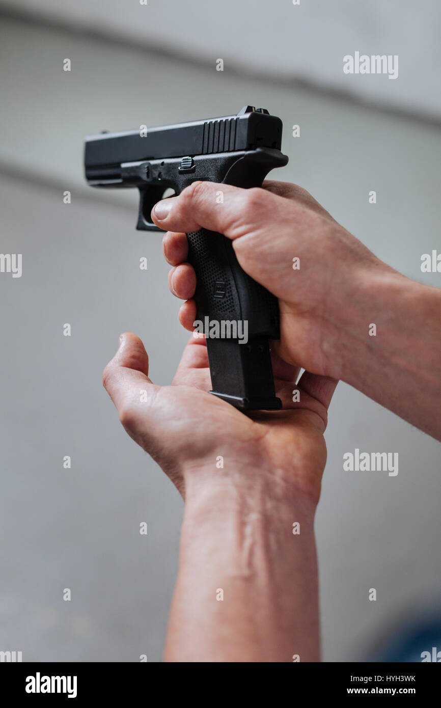 Close up of a cartridge clip being taken out Stock Photo - Alamy