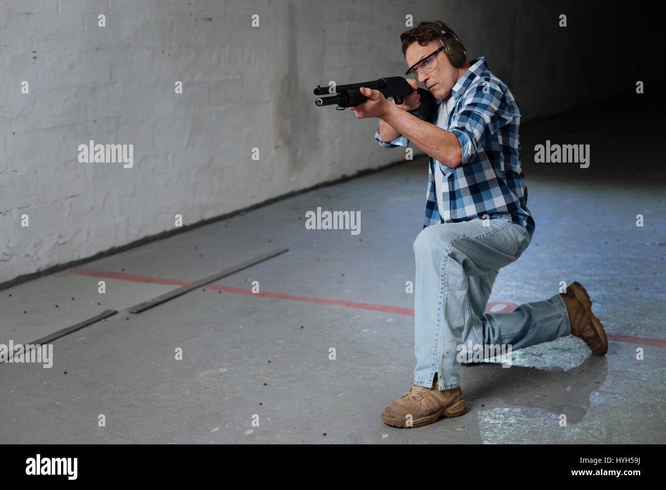 Brutal handsome man looking at his target Stock Photo - Alamy