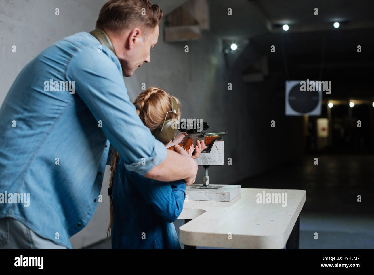 Nice confident girl looking at the target Stock Photo - Alamy