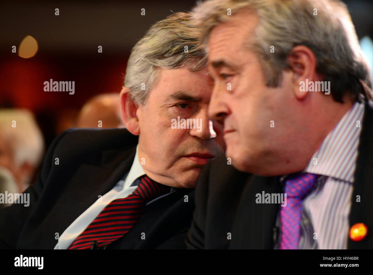 Former Prime Minister Gordon Brown (L) speaks aside to Midlothian MP ...