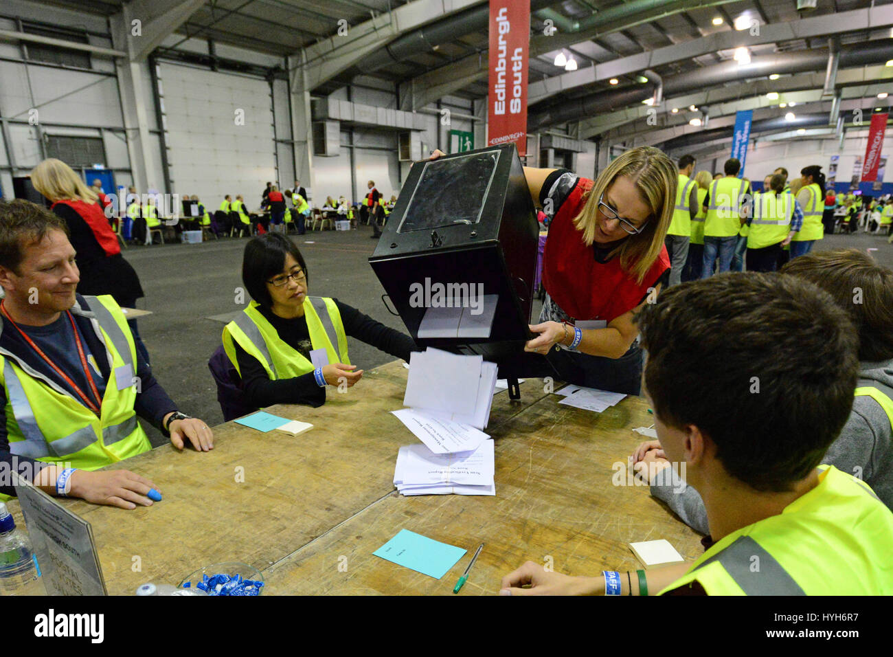 The first ballot boxes are opened at the Edinburgh count for the ...