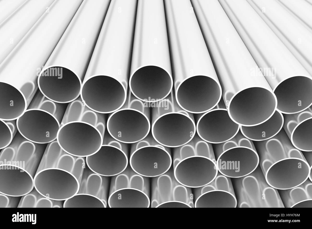 Metal tubes stacked close up image Stock Photo - Alamy