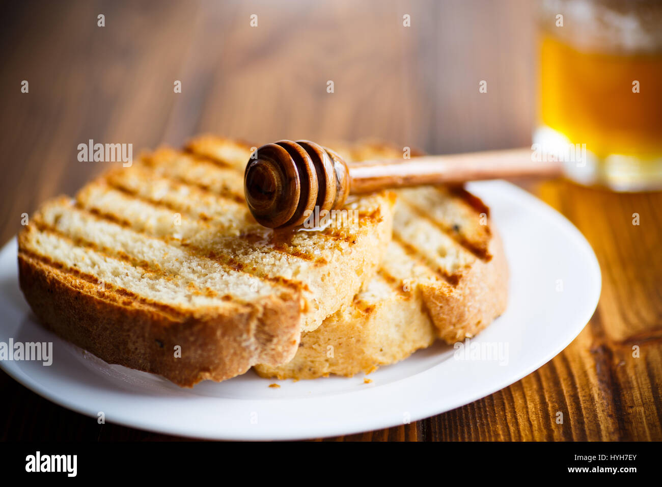 Fried toast with honey Stock Photo - Alamy