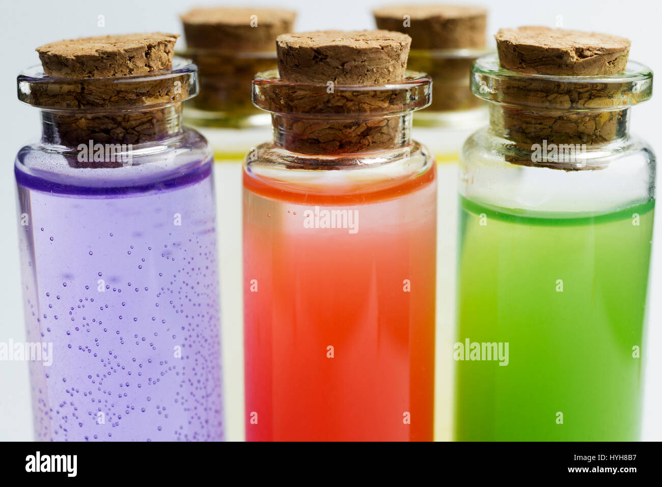 three flasks for laboratory measurement of liquids on a white ...