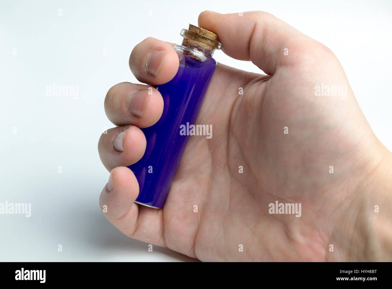 Hand holding test tube hi-res stock photography and images - Alamy