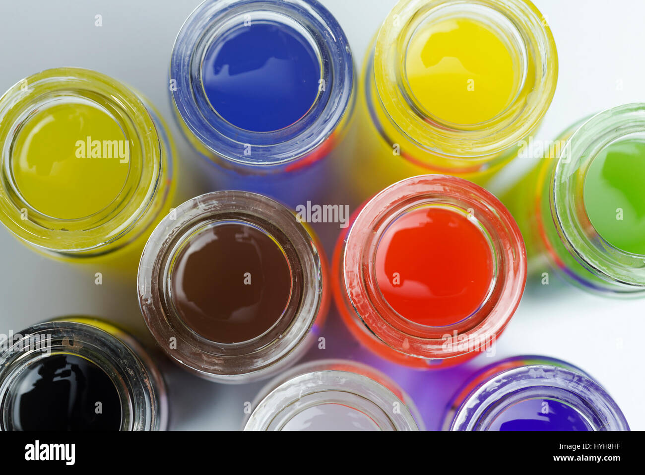 Open the flask of liquid on a white background Stock Photo - Alamy
