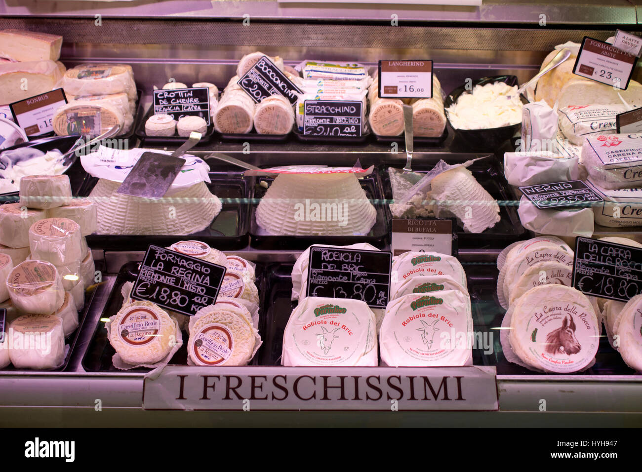 Eataly famous food store market: collection of Parmigiano cheese dop ...