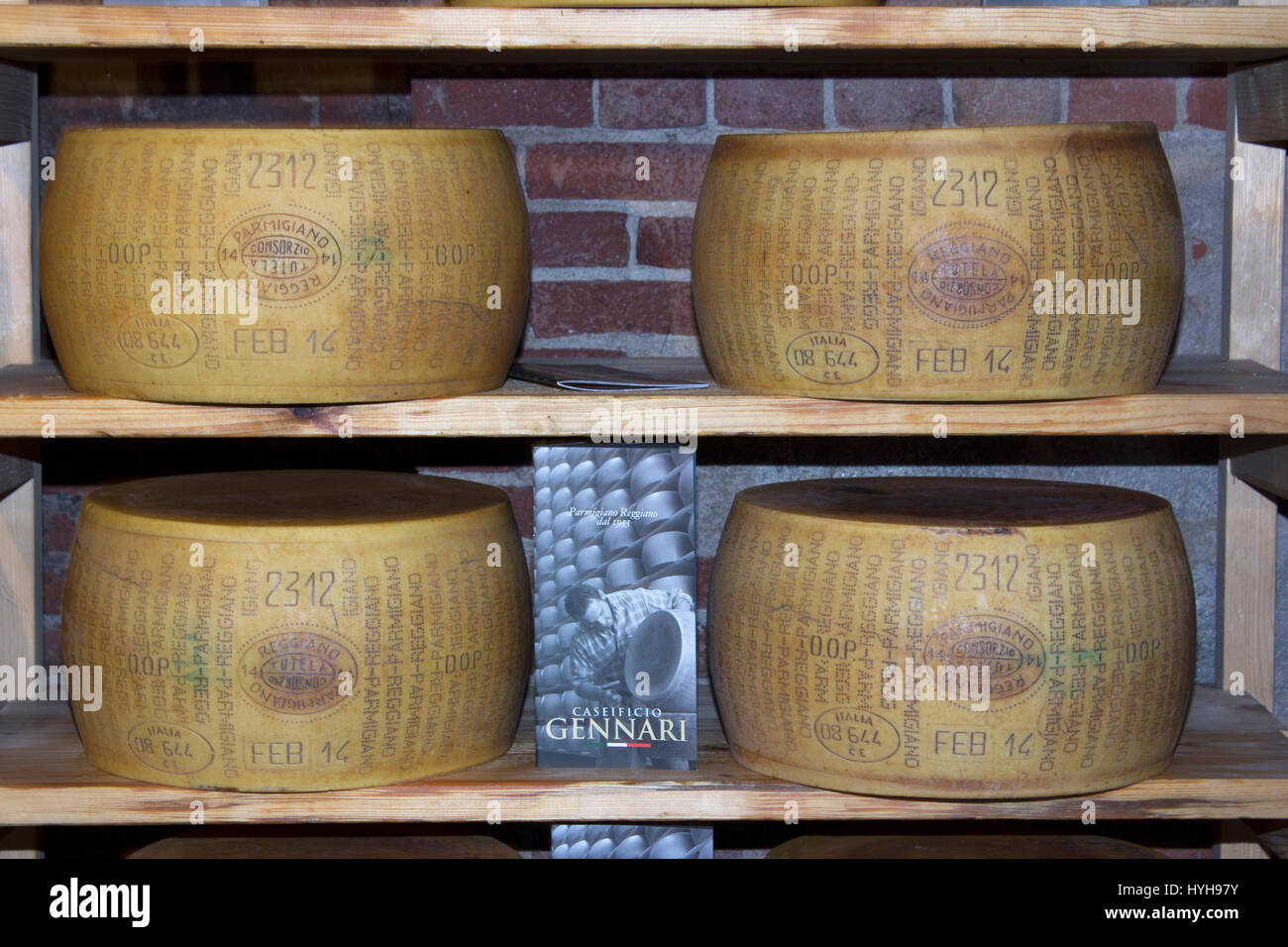 Eataly famous food store market: collection of Parmigiano cheese dop ...