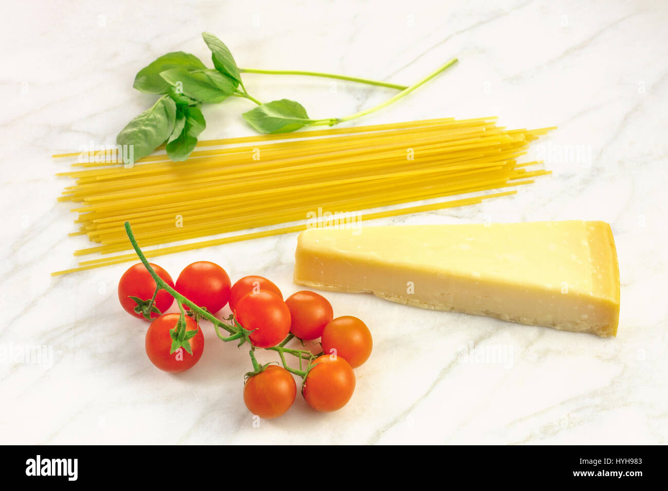 Basic pasta ingredients, including spaghetti and cheese Stock Photo - Alamy