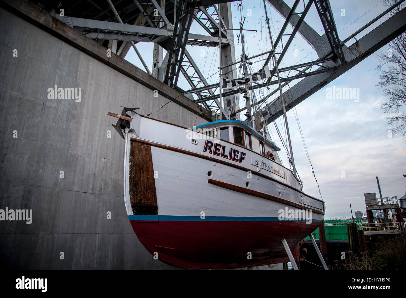 Boat called relief advertising Sandbar restaurant, Granville Island ...