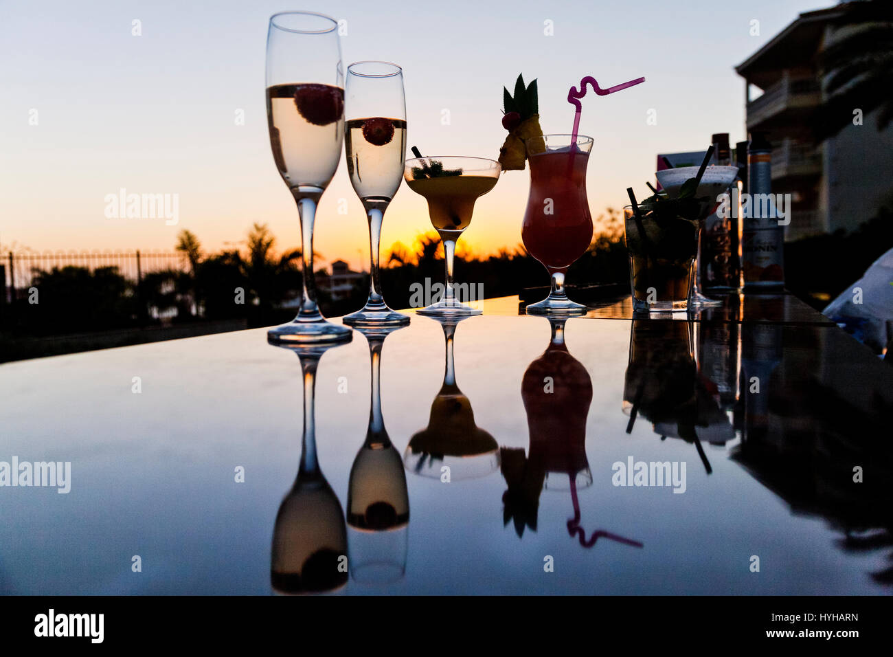 Cocktails at an outside bar at sunset in the warm sunshine Stock Photo ...