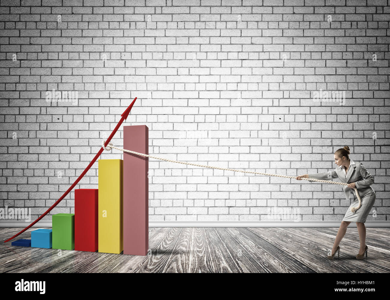 Businesswoman pulling graph with rope as symbol of power and control ...
