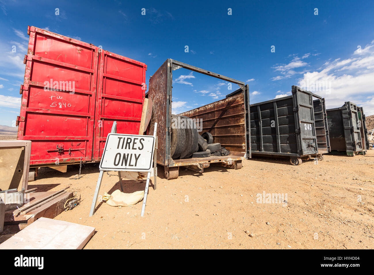 Worn out, discarded items in a recycling dumpster Stock Photo - Alamy