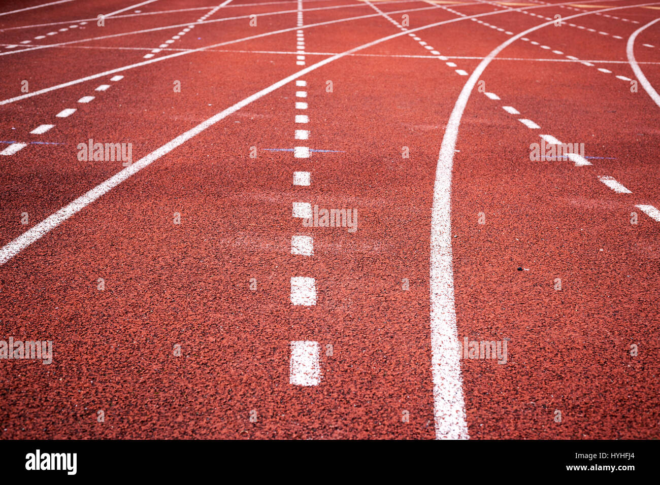 A view of one of the lanes on a running track Stock Photo - Alamy