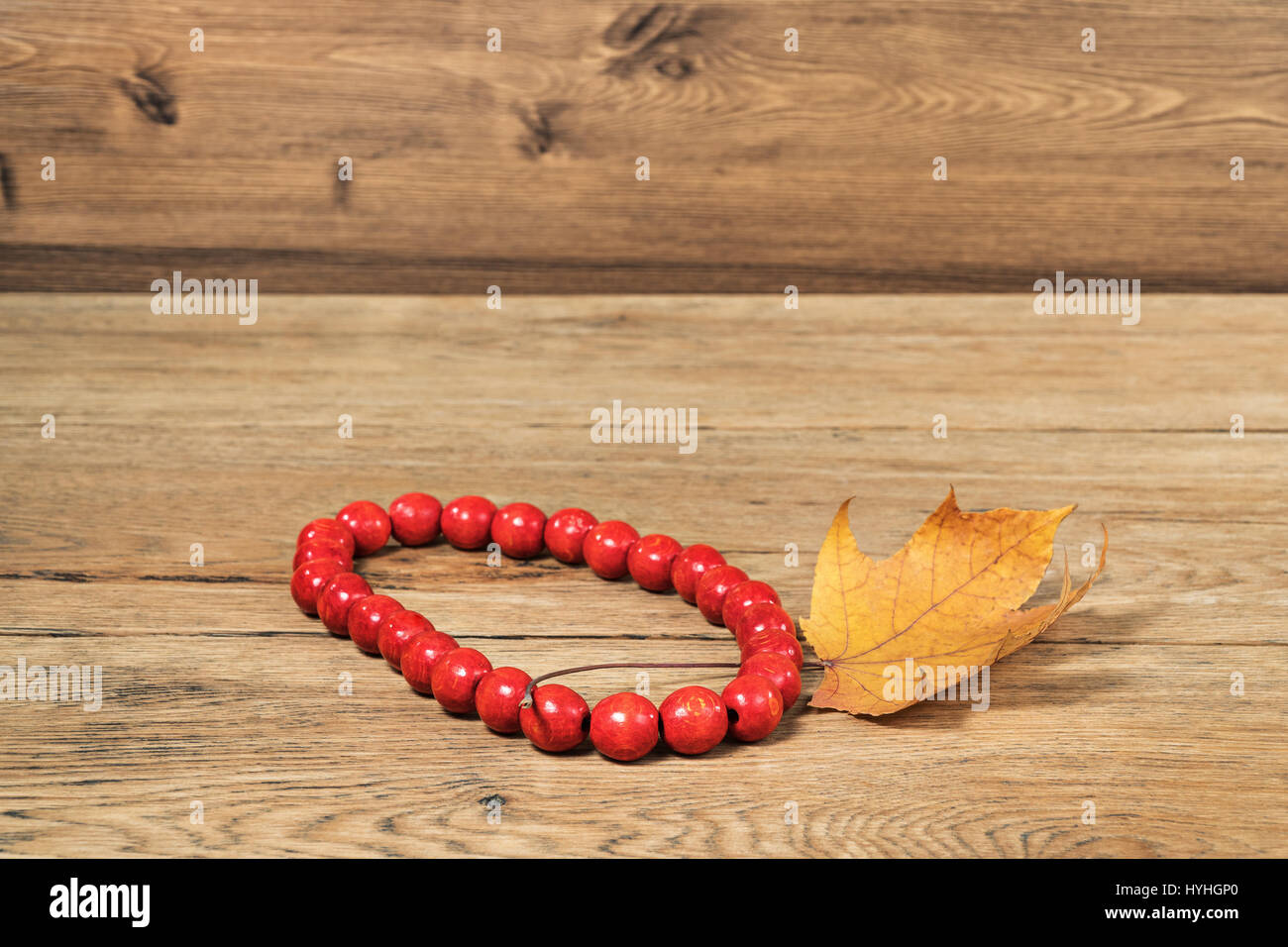 Autumn leaves with beads hi-res stock photography and images - Alamy