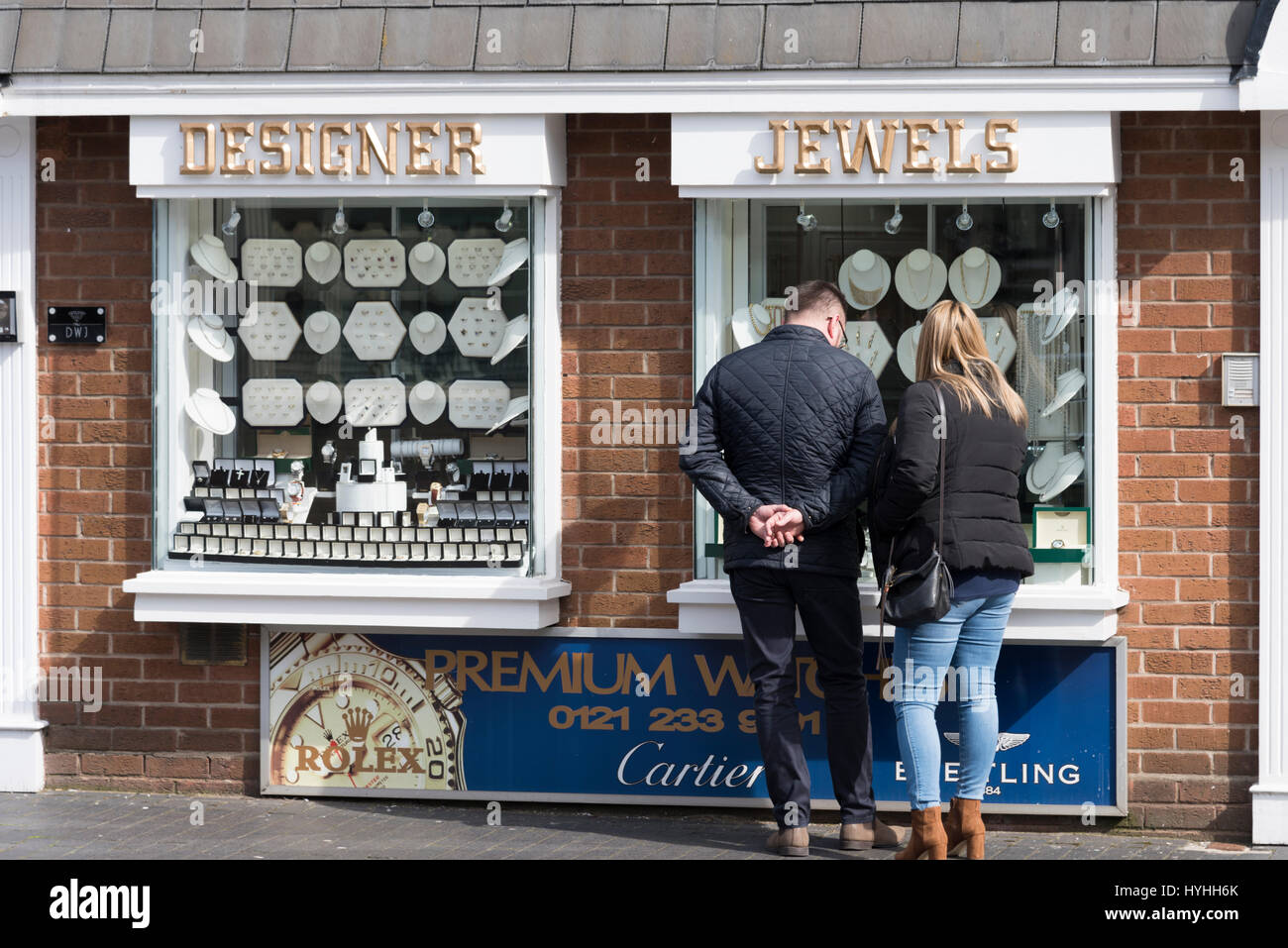 Man looking at wedding rings hi-res stock photography and images - Alamy