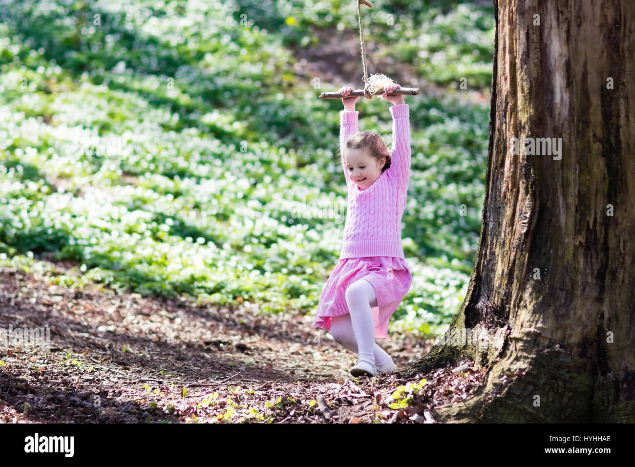 Child swinging tree branch High Resolution Stock Photography and Images ...