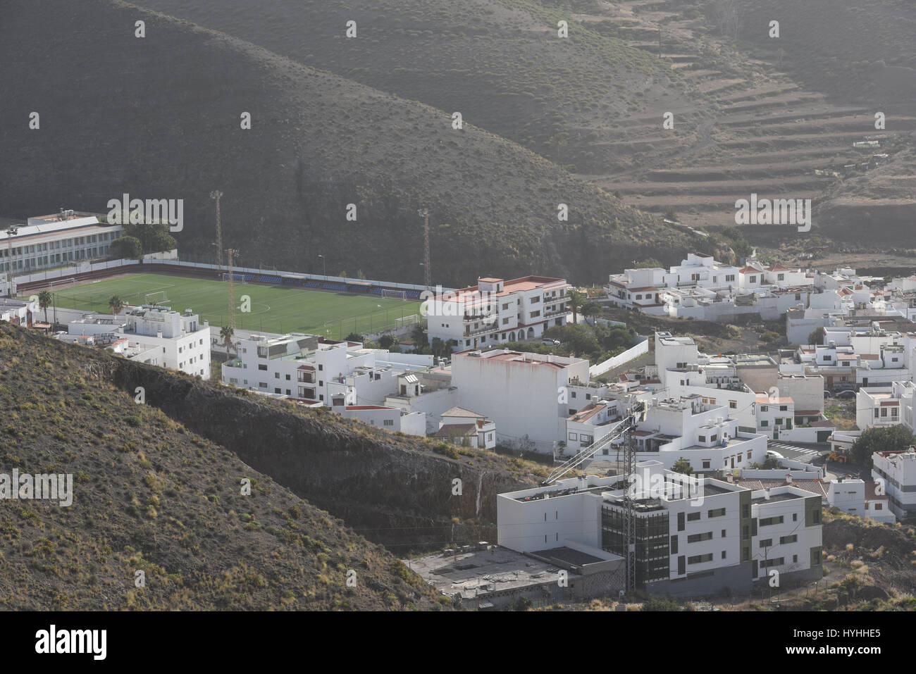 Football field from above between mountains Stock Photo - Alamy