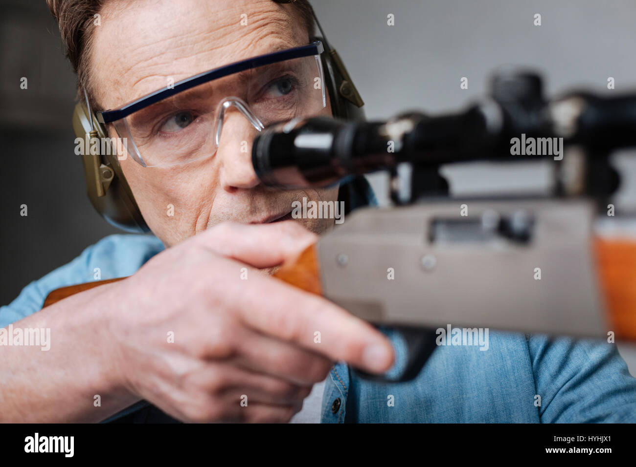 Good looking handsome man wearing safety glasses Stock Photo - Alamy