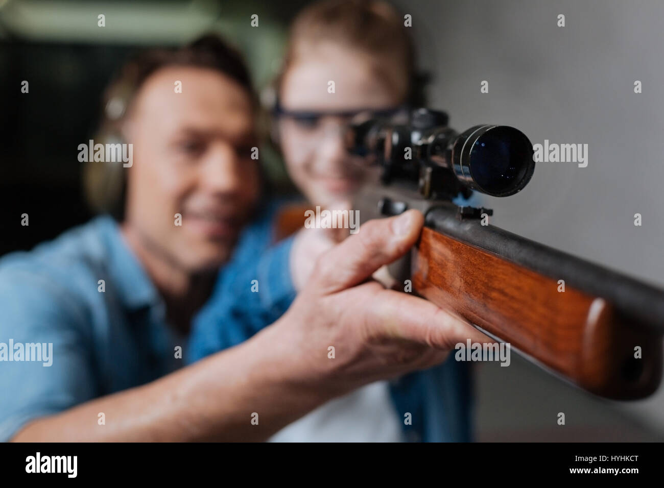 Selective focus of a gun with an optical sight Stock Photo - Alamy