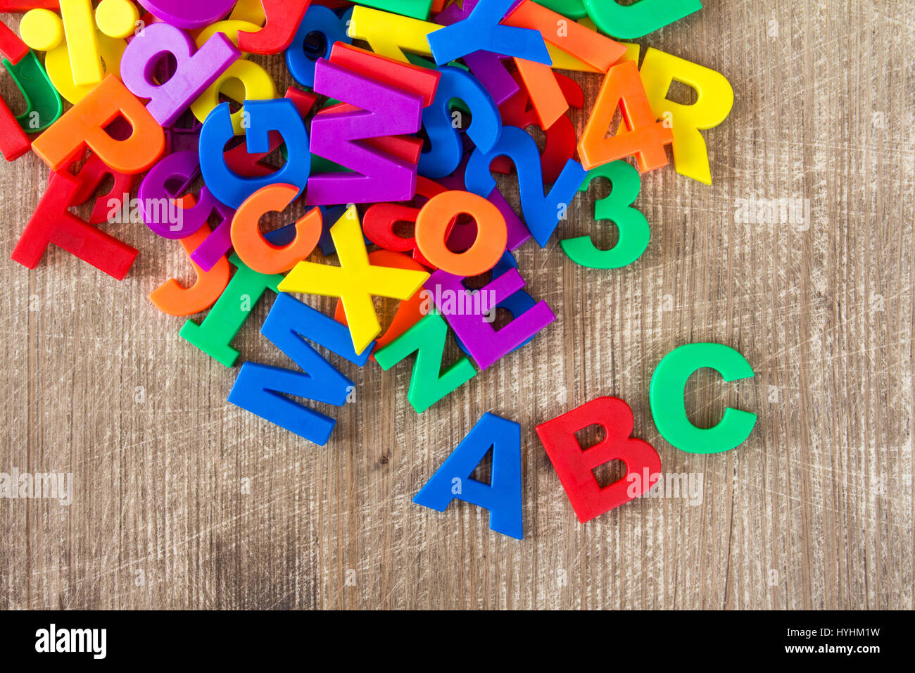 Set of plastic colorful letters and numbers Stock Photo - Alamy