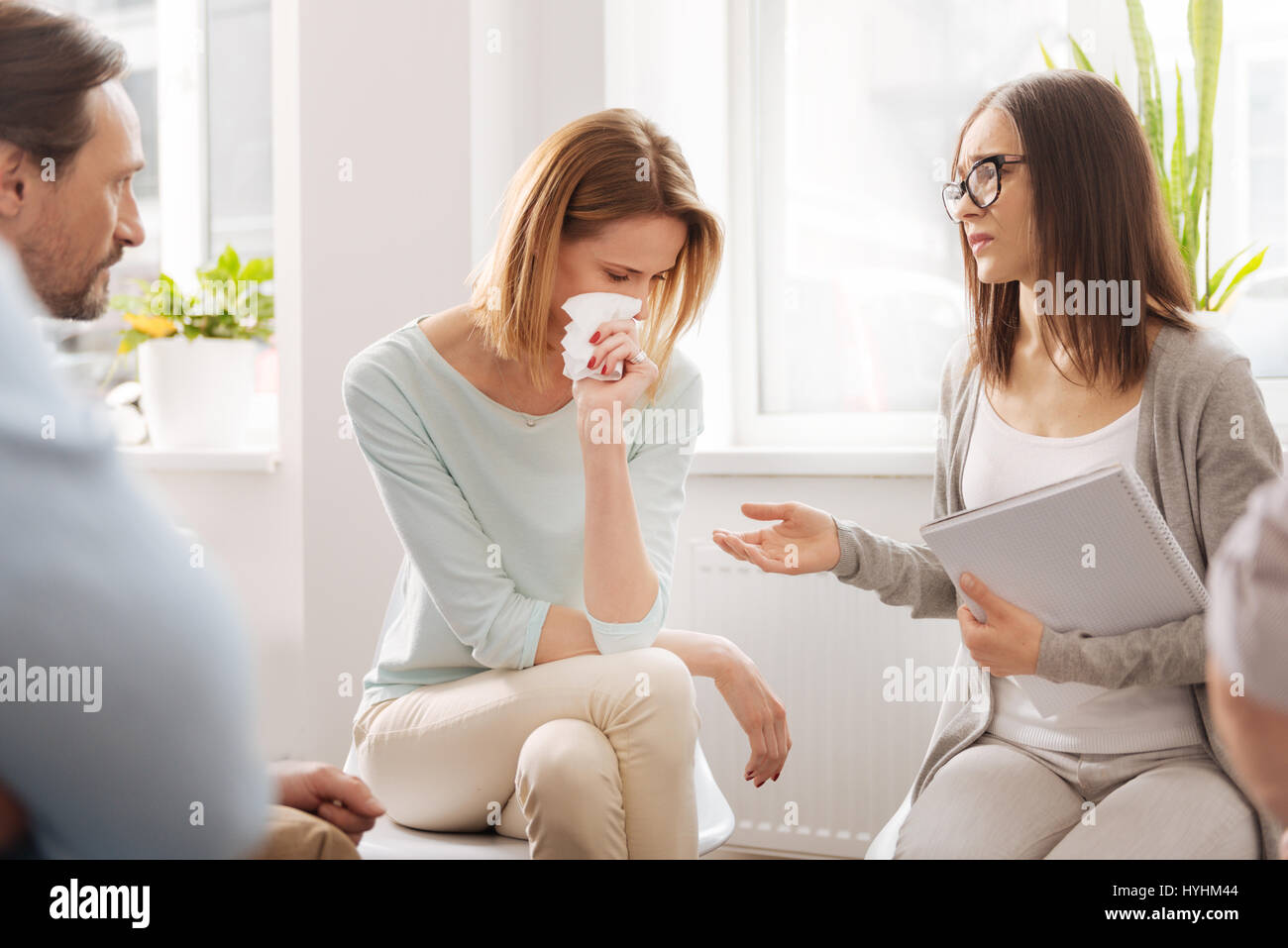 Very sad women discussing some problems Stock Photo - Alamy