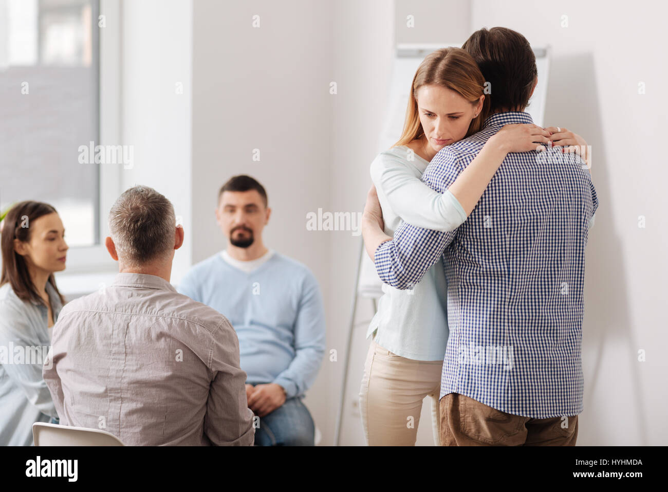 Upset female being deep in thoughts Stock Photo - Alamy