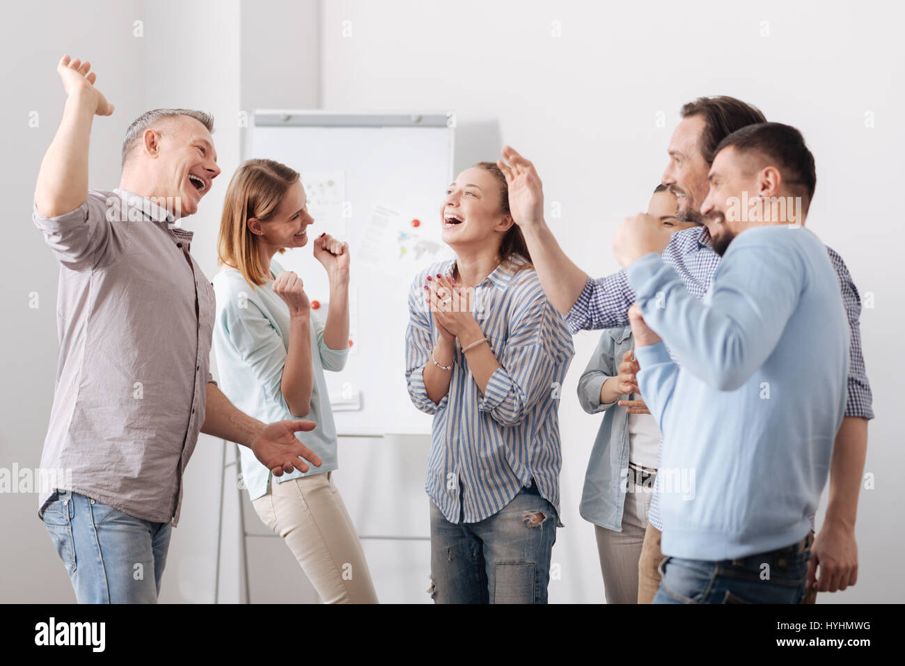 Group of office workers expressing positivity after teambuilding Stock ...