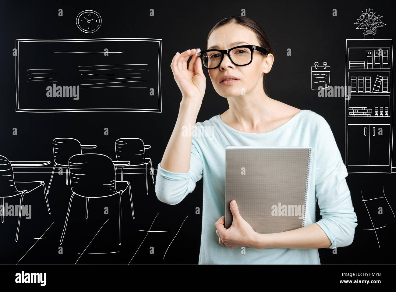 Curious teacher working at school Stock Photo - Alamy