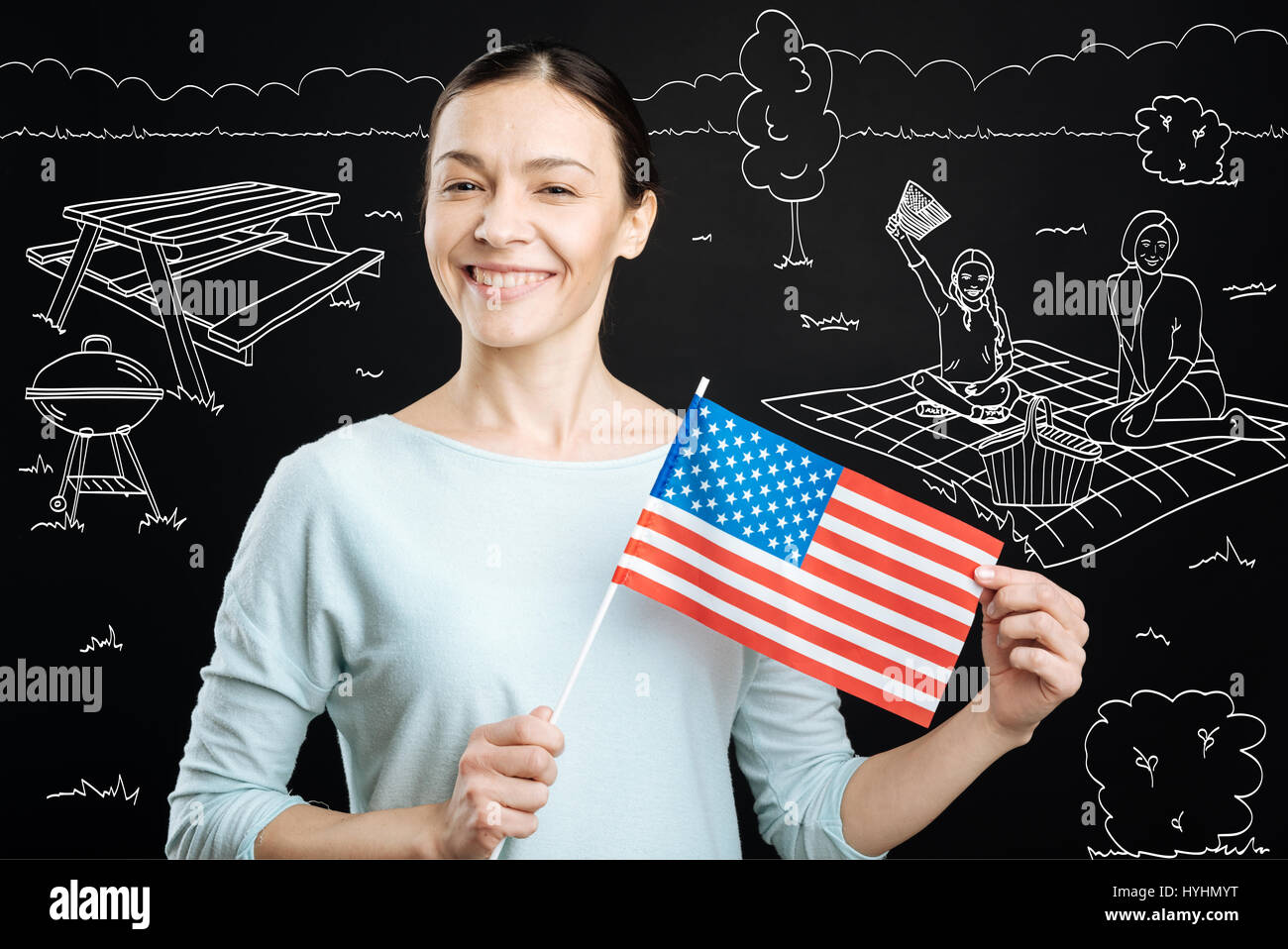 Proud positive woman celebrating independence day Stock Photo - Alamy
