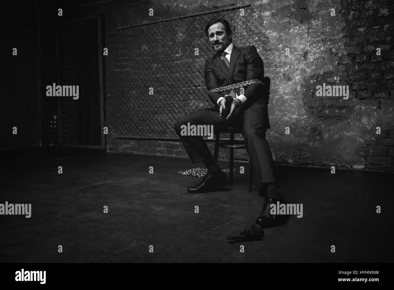 Man reaching gun hi-res stock photography and images - Alamy