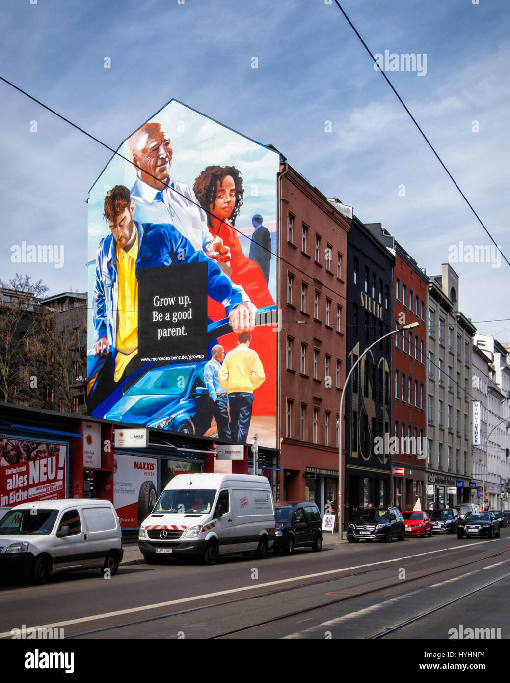 Giant mural Mercedes Benz advertisement in Mitte Berlin. Advertising ...