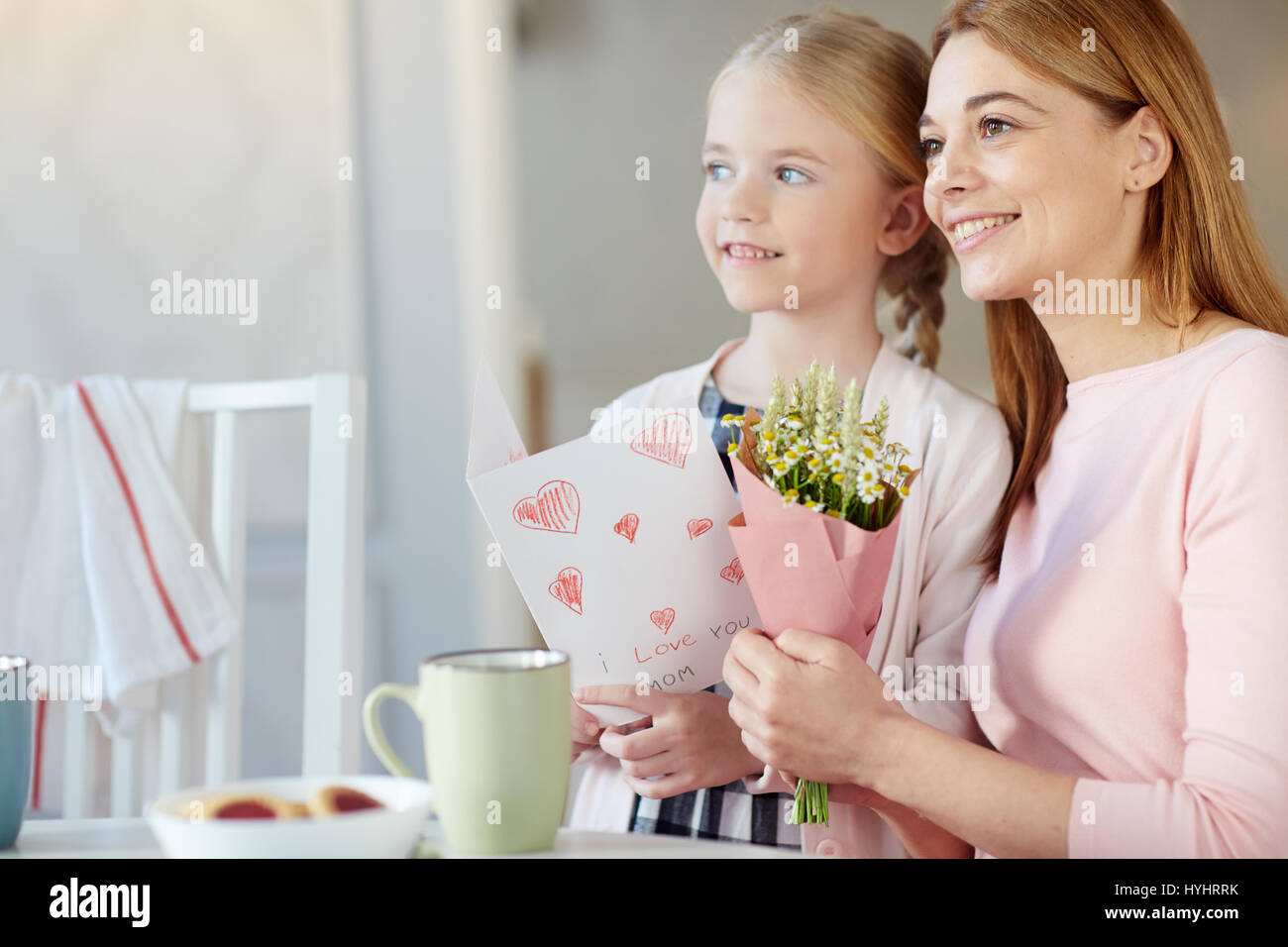 Girl with mom Stock Photo - Alamy